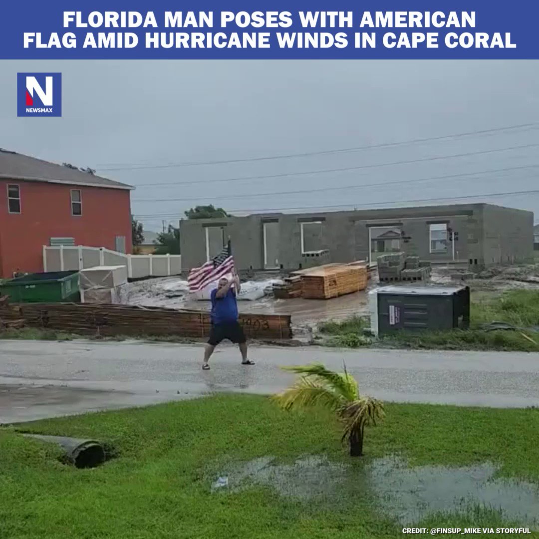 Storm Patriot A Cape Coral Florida Man Held Up The American Flag As