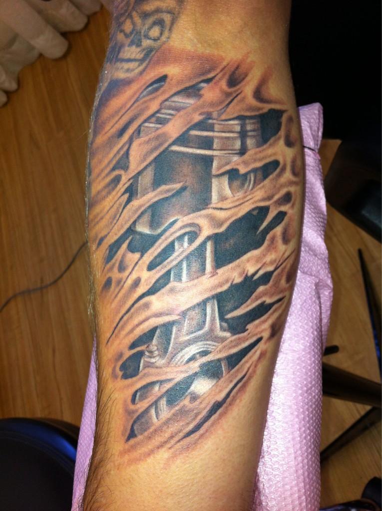 Ripping Skin Back Tattoo