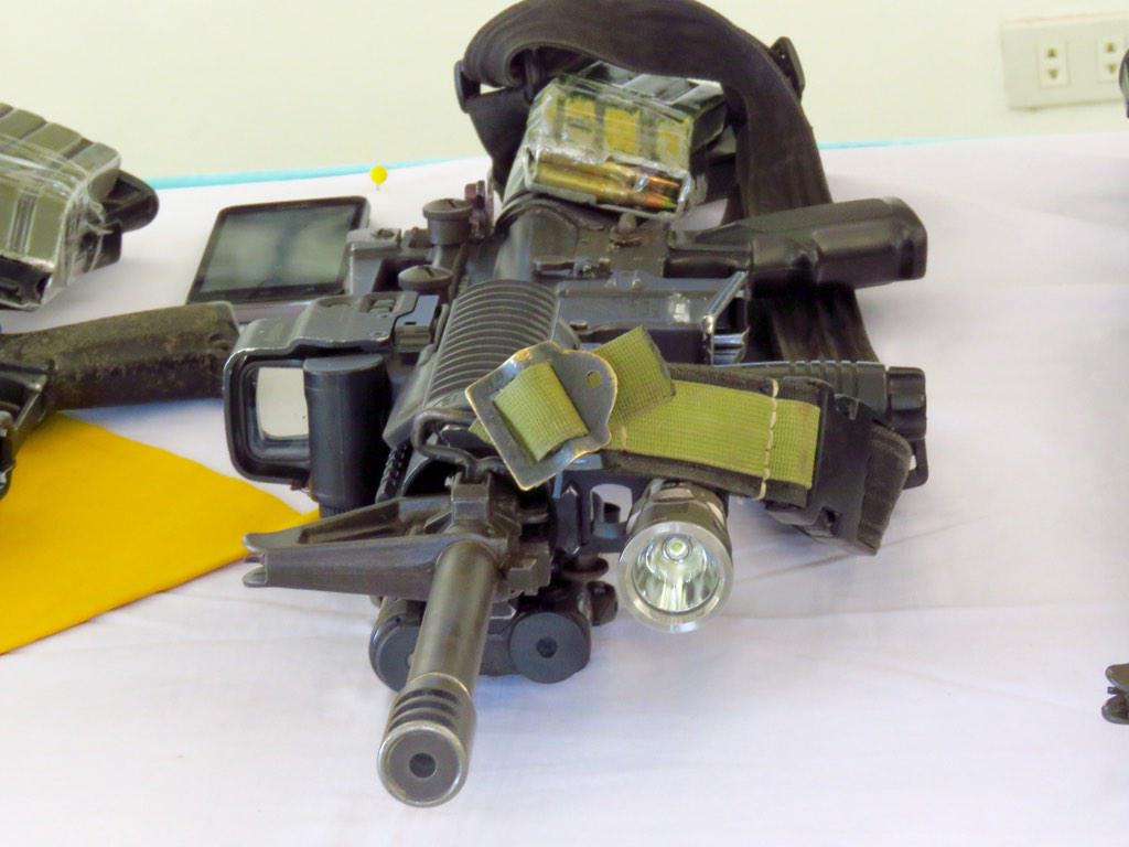 A complete M4 rifle equipped w/ optics, laser designator and tactical ...