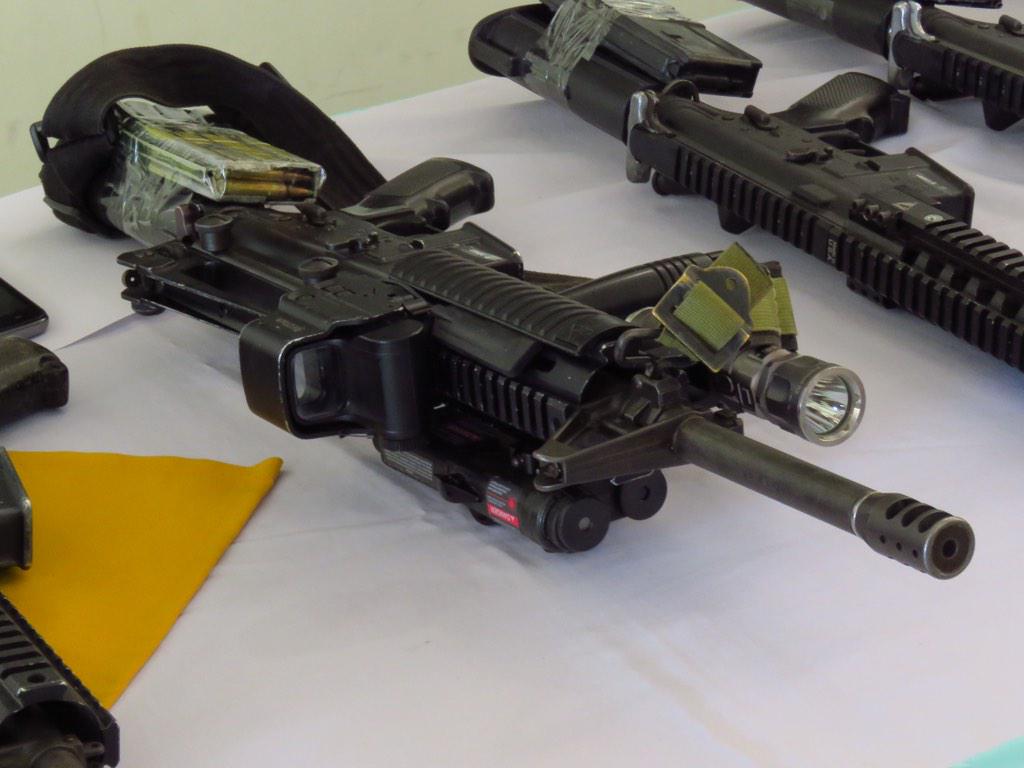 A complete m4 rifle equipped w/ optics, laser designator and tactical ...