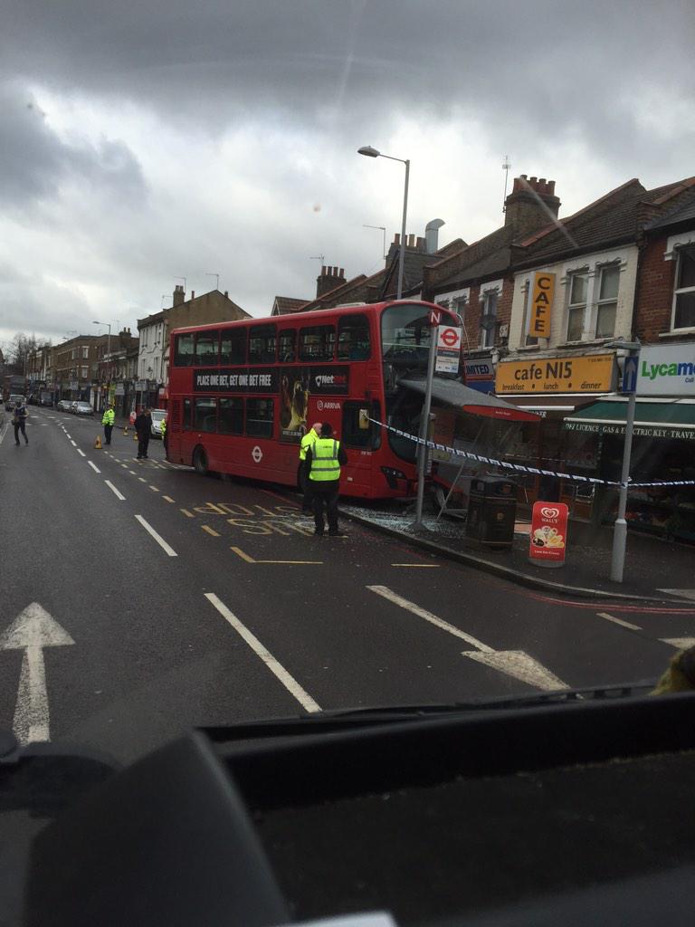 Double-decker crashes into bus stop in north London - ITV News