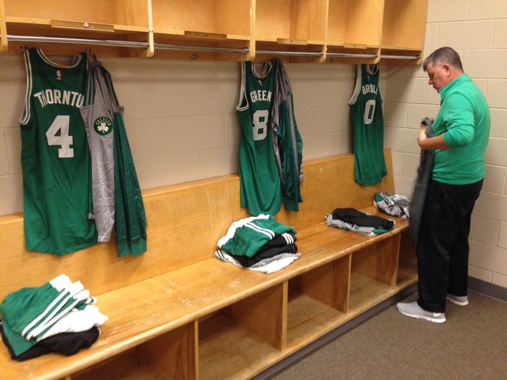 Equipment manager Johnny Joe Connor sets up the Celtics locker room in ...