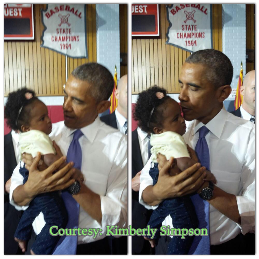 POTUS BarackObama kisses baby of Jarvis Johnson, the excited Phoenix ...
