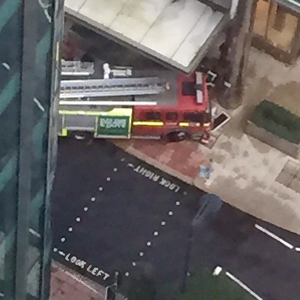 Three injured as fire engine crashes into building at Canary Wharf ...