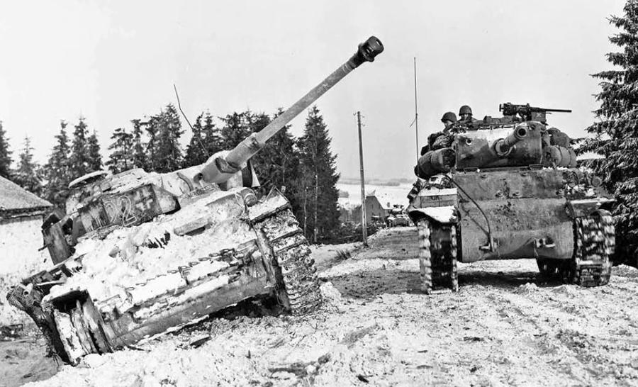 German Panzerkampfwagen: An M36 tank destroyer passes a destroyed ...