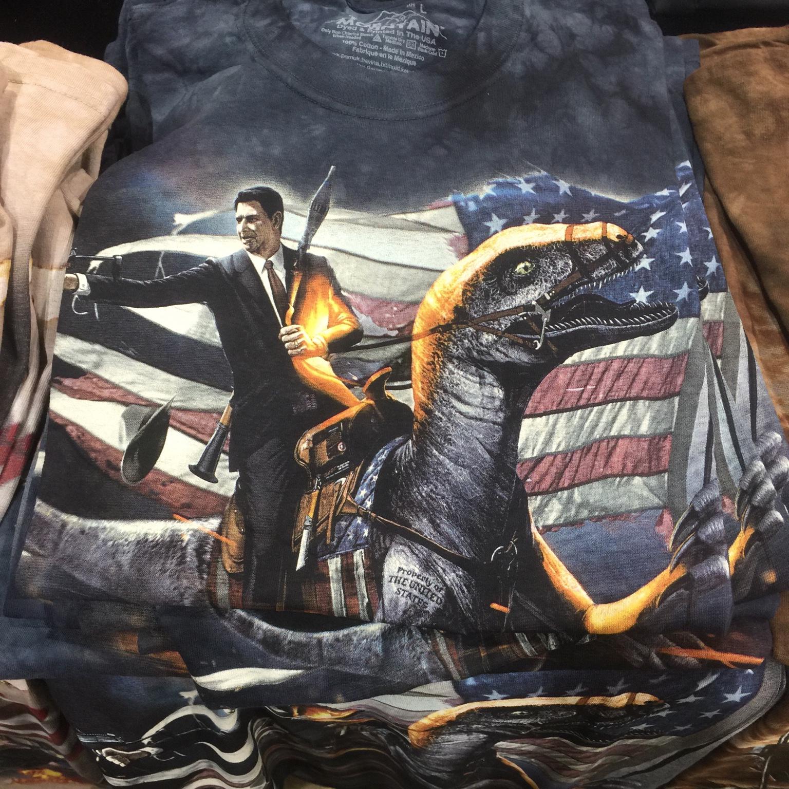 Ronald Reagan Riding A Velociraptor