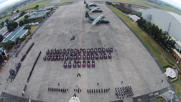 Aerial view of arrival ceremony at Villamor Air Base in honor of fallen ...