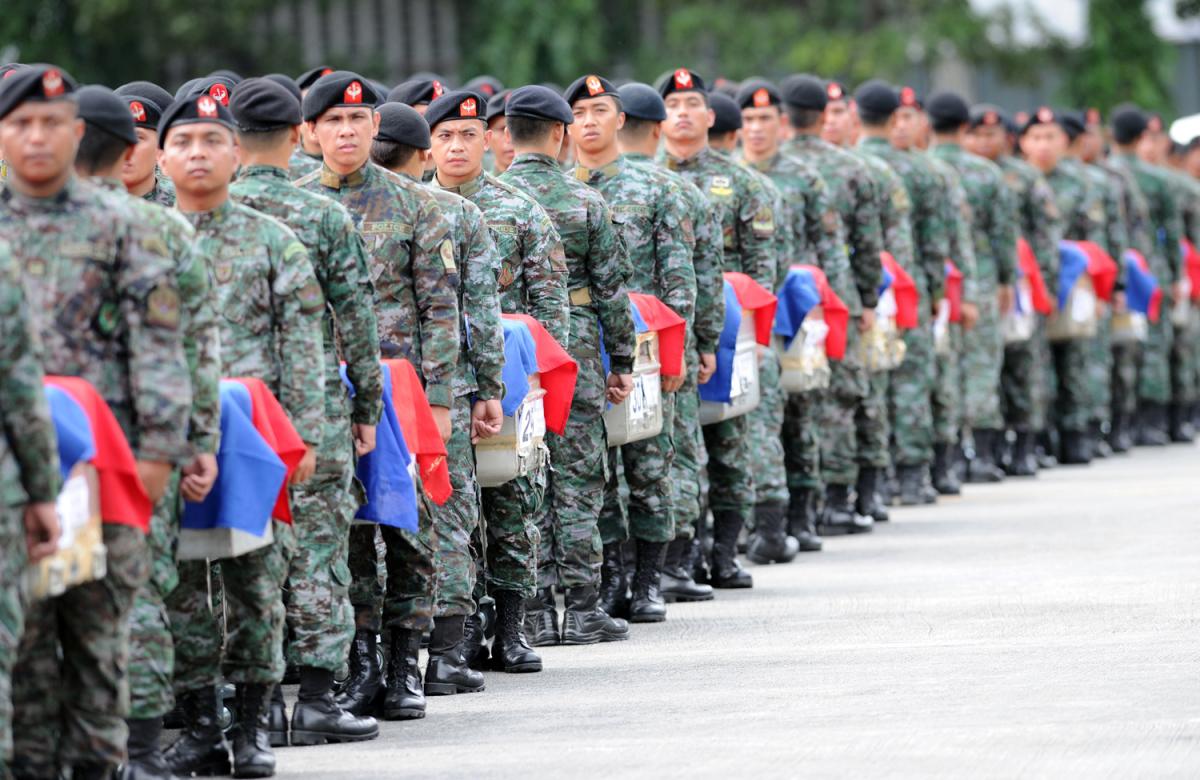 Philippines honors commandos killed fighting rebels Photo: Ted Aljibe ...