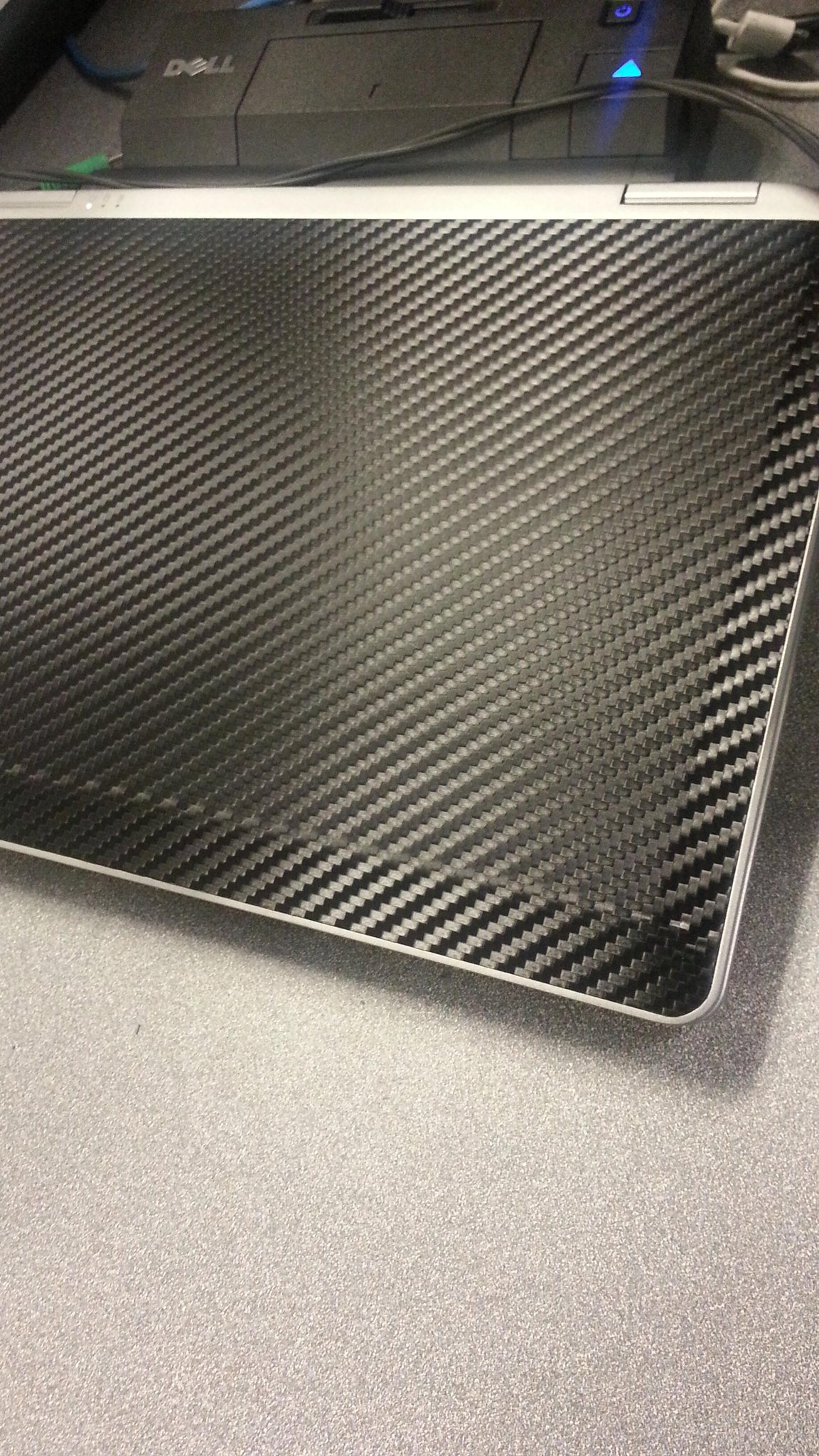 3M Scotchprint is much easier to apply than Dinoc