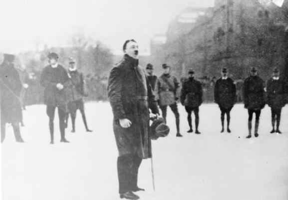 A young Adolf Hitler addressing a small National Socialist German ...