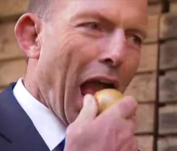 Australian Prime Minister Tony Abbott ate a raw onion, skin and all ...