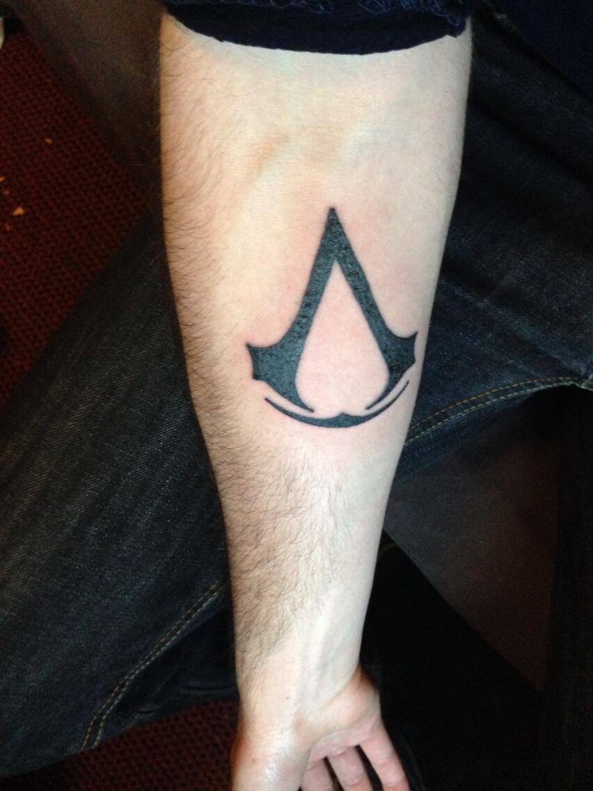 Assassins Creed Logo Tattoo