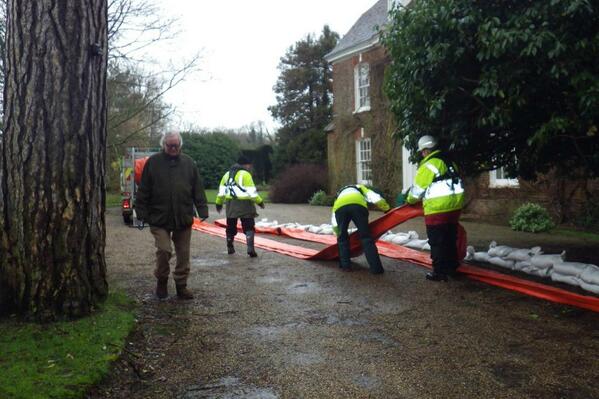 Emergency services lay flood defences - ITV News