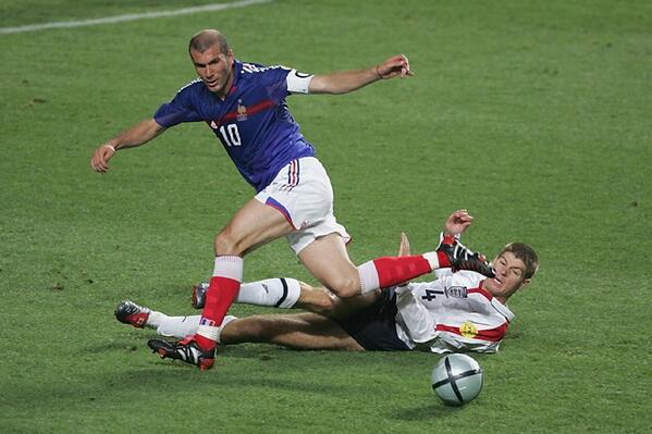 Gerrard wins a tackle against the legendary zinedine zidane during the ...