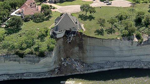 PHOTOS: House in danger of falling into lake because cliff where it was ...