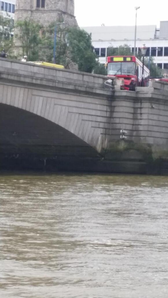 London bus left hanging partly over the River Thames - ITV News