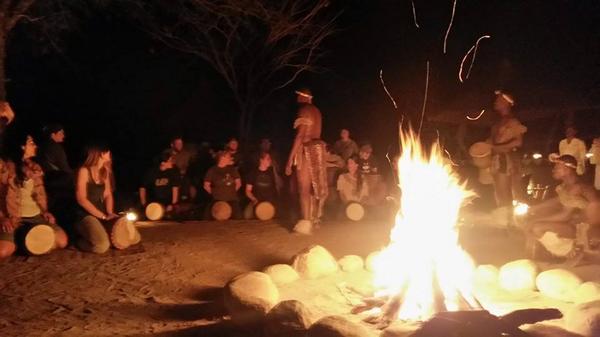 African People Dancing Around Fire