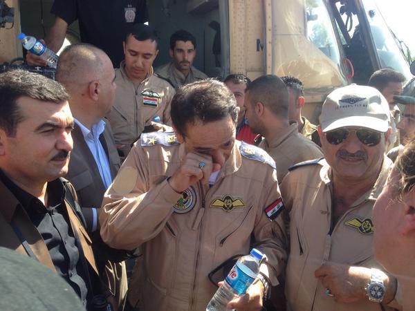 Iraqi pilot cries following airlift from Mount Sinjar - ITV News