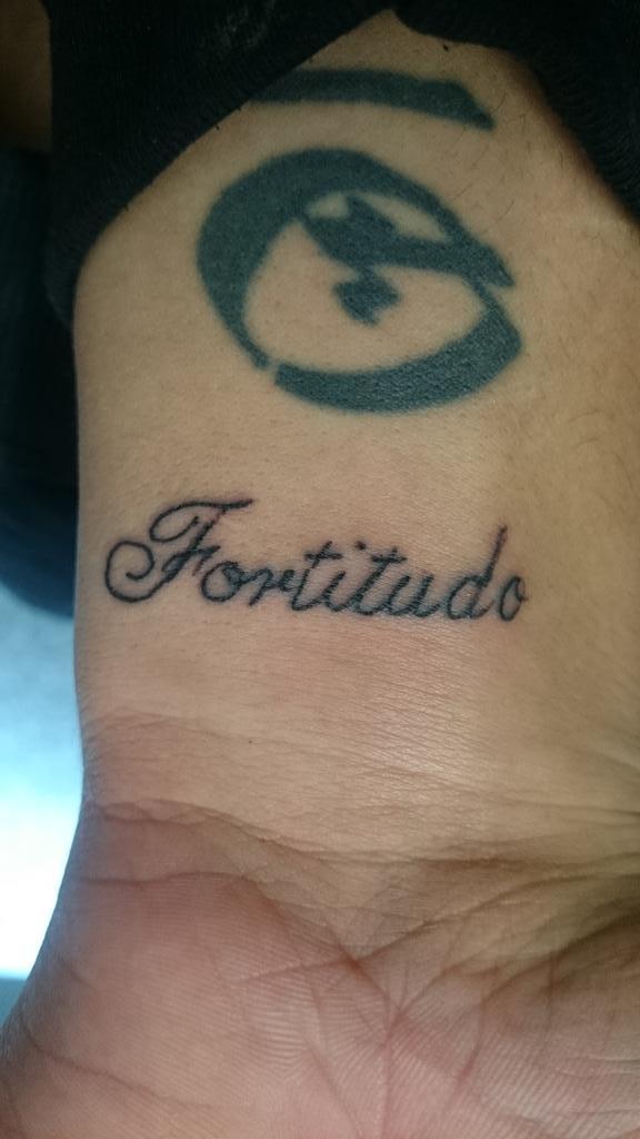 Strength In Latin Tattoo