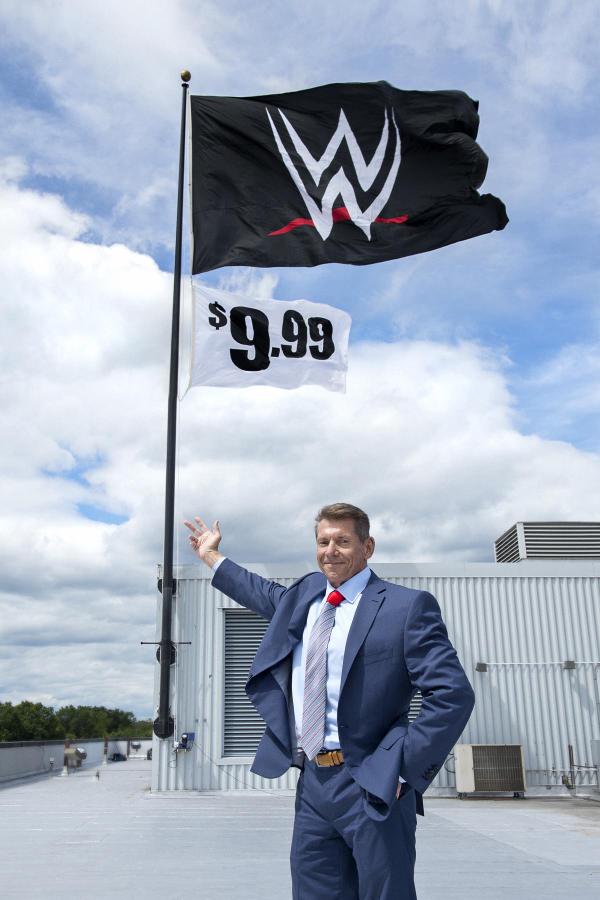 Vince raising the two WWE flags : r/SquaredCircle