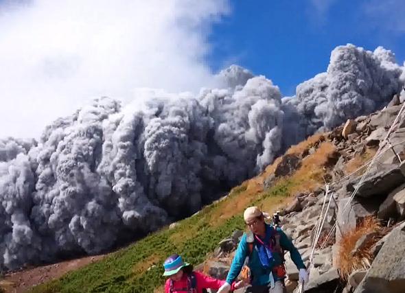 People Running From Volcano