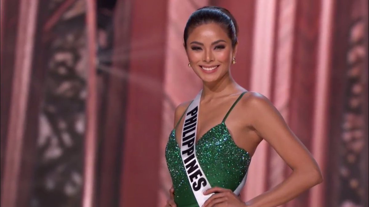 maxine medina shines in her green evening gown during the preliminary ...