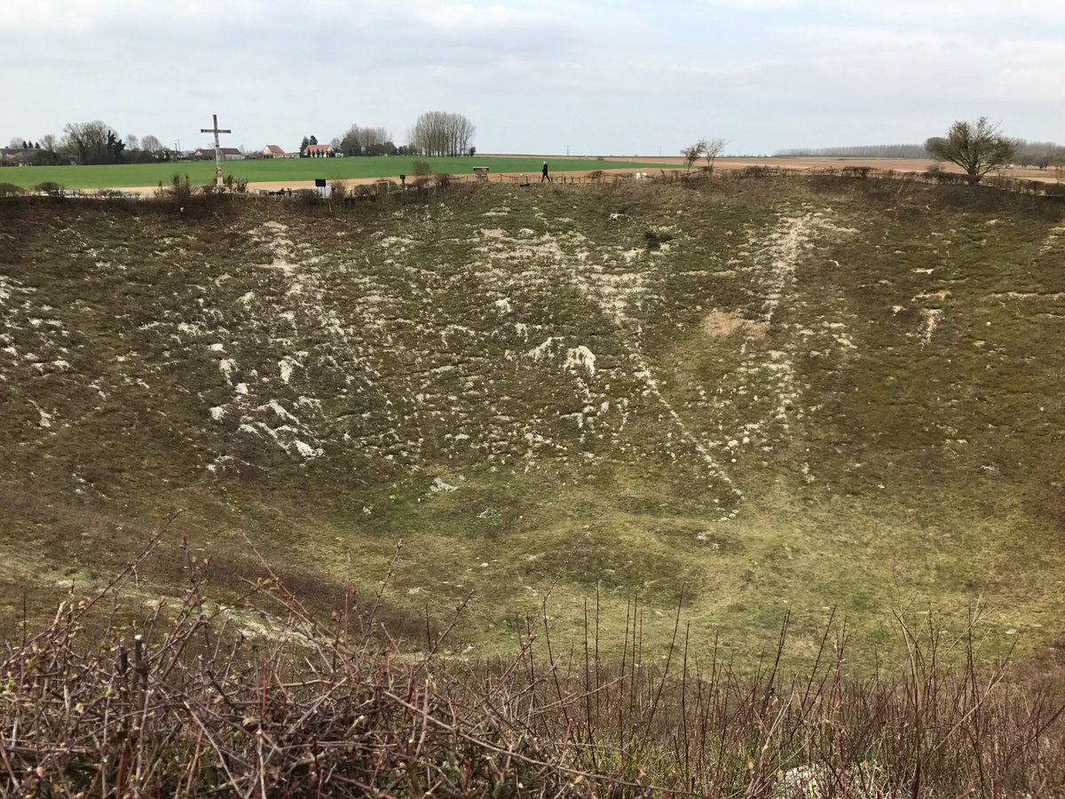 Lochnagar mine crater, blown up on first day of the somme, then and now ...