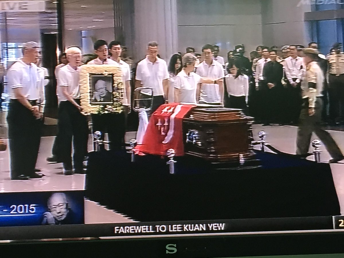 Li Yipeng, grandson of Mr LeeKuanYew, places portrait of Mr Lee in front of casket | The Straits ...