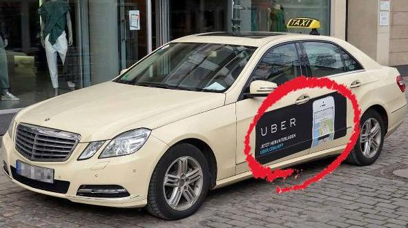 UBER does advertising on plenty taxis in Berlin and other german cities ...