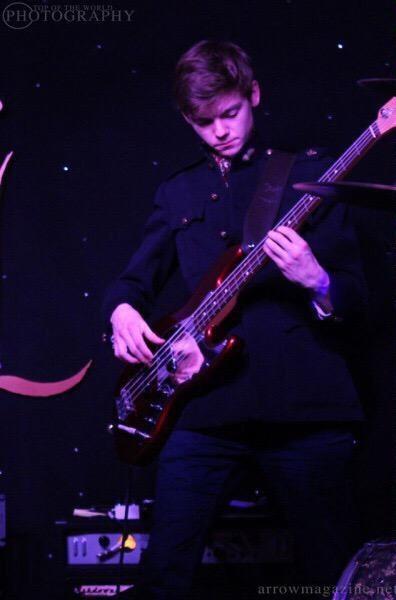 Thomas Sangster Playing Guitar