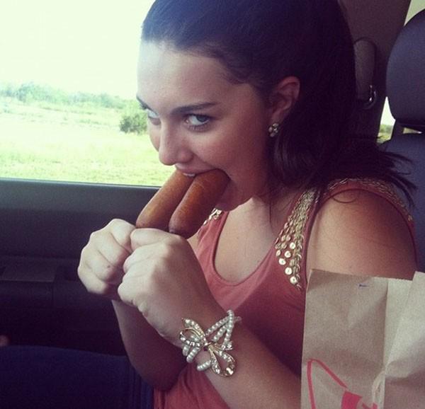 Girls Eating Corn Dogs