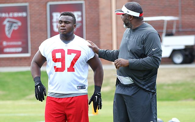 D-line coach Bryan Cox and new Falcon GradyJarrett have already formed ...