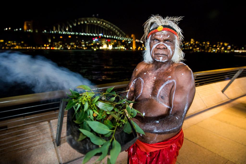 Aboriginal Elder Uncle Max Eulo performs a traditional smoking ceremony ...