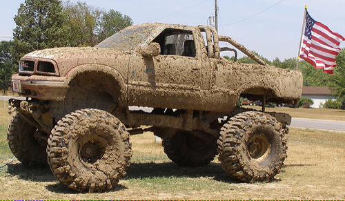 Lifted Trucks With Stacks Mudding