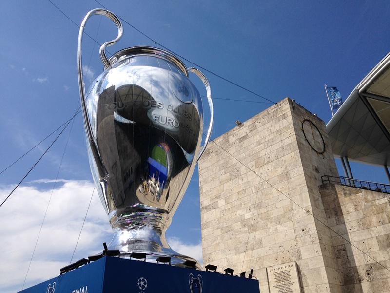 A giant UCL trophy overlooks the historic Olympiastadion. Our coverage ...