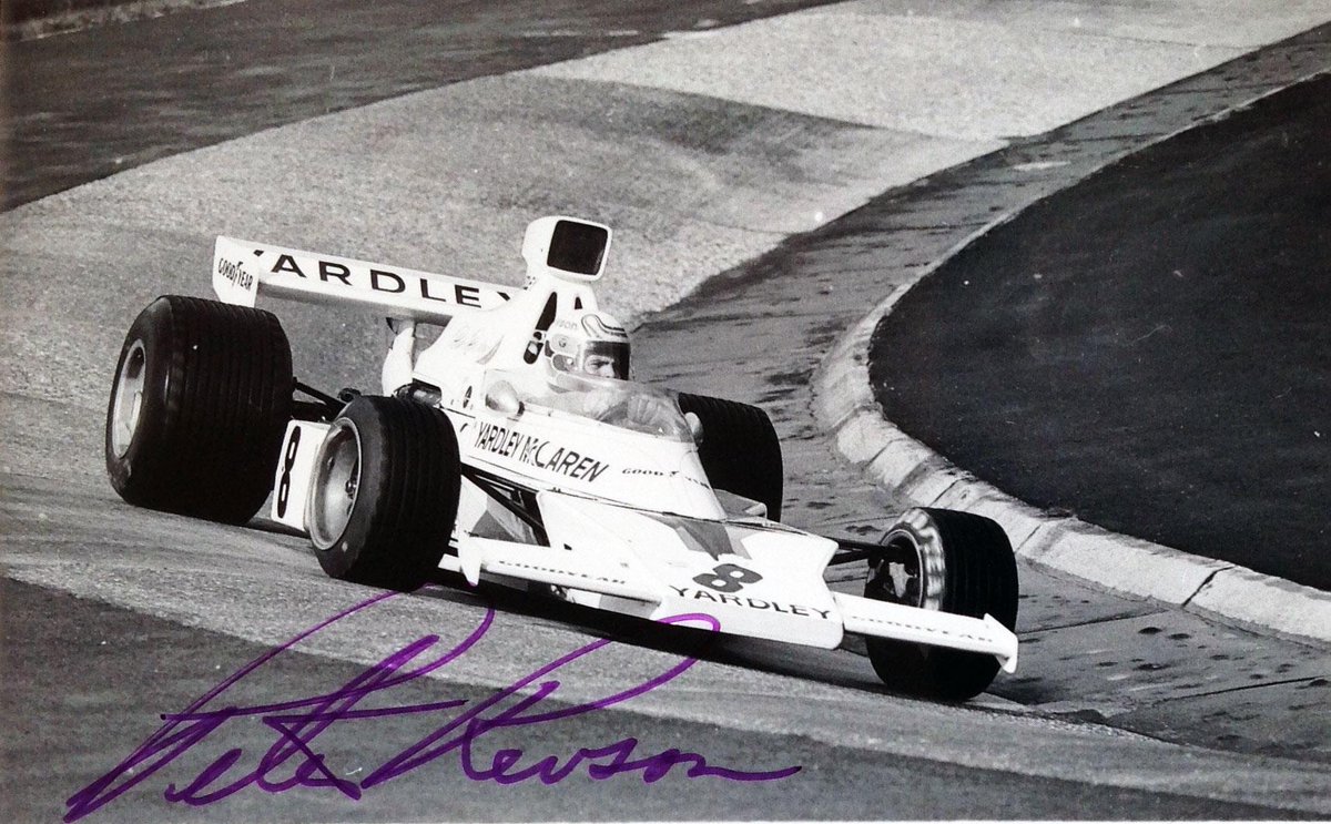 This signed Peter Revson pic is must-have. Show us the driver ...