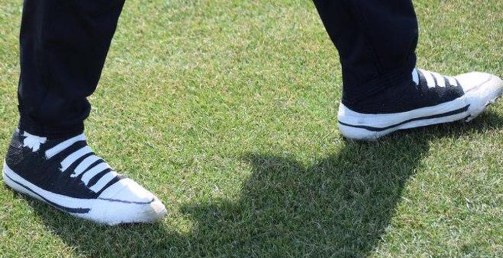 Redskins NachoLyfe taped cleats to look like Chuck Taylors, slippers ...