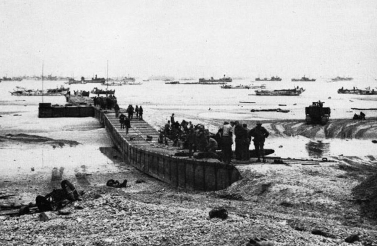D-day plus 4 — construction of pontoon causeway after allied landings ...
