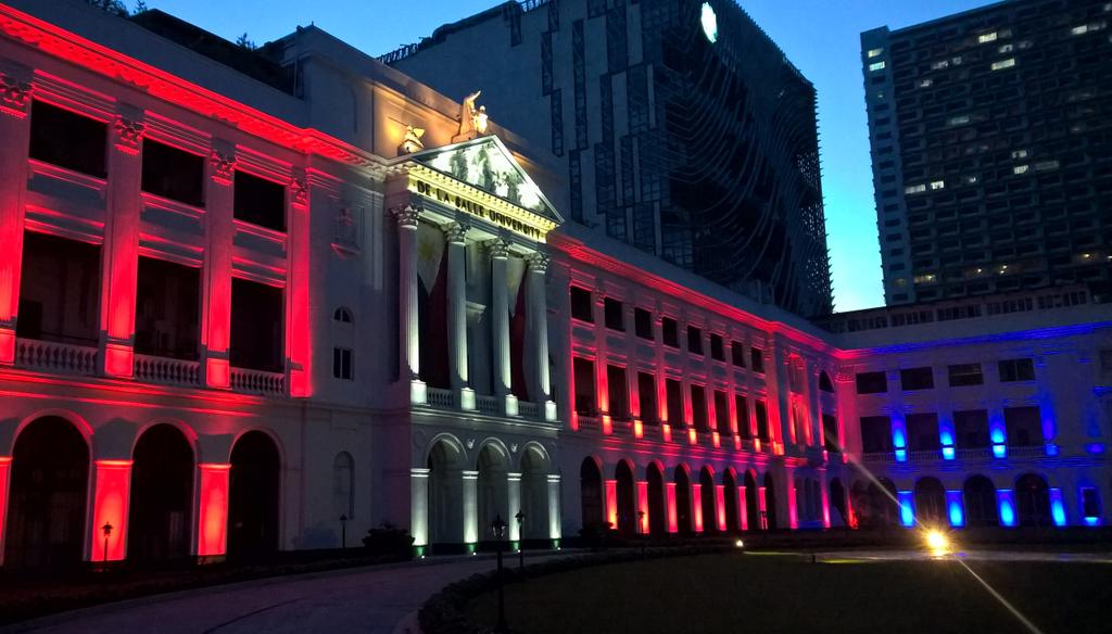 DLSU's St. La Salle Hall lit up in red, white & blue to commemorate ...