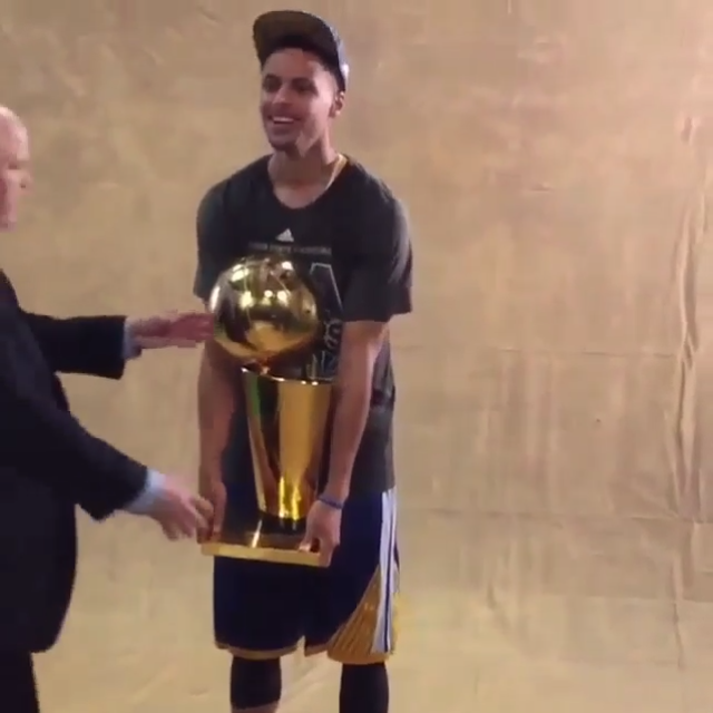 Steph curry poses with the championship trophy for a photo shoot, riley ...