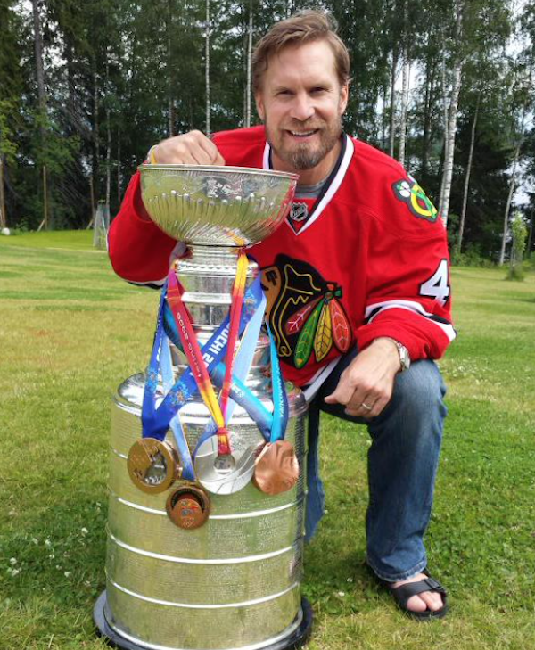 Timonen drapes his 4 Olympic medals over the Stanley Cup : r/hockey