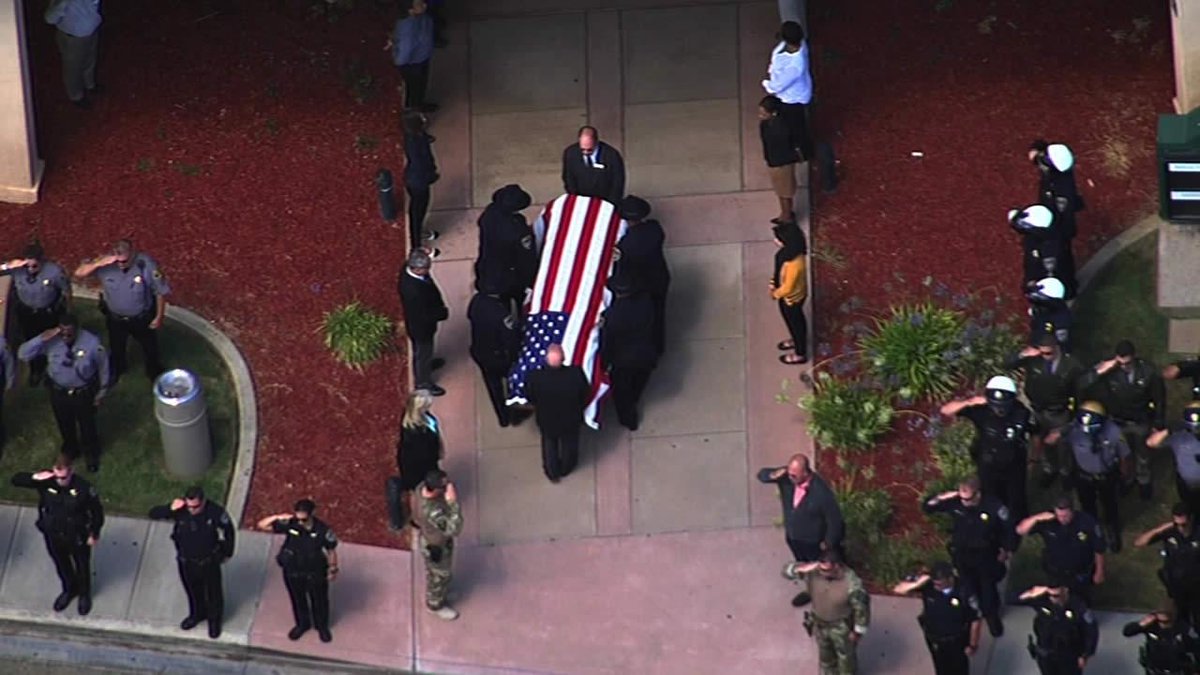 PHOTOS: Hayward police carry casket of slain Sgt. Scott Lunger inside ...