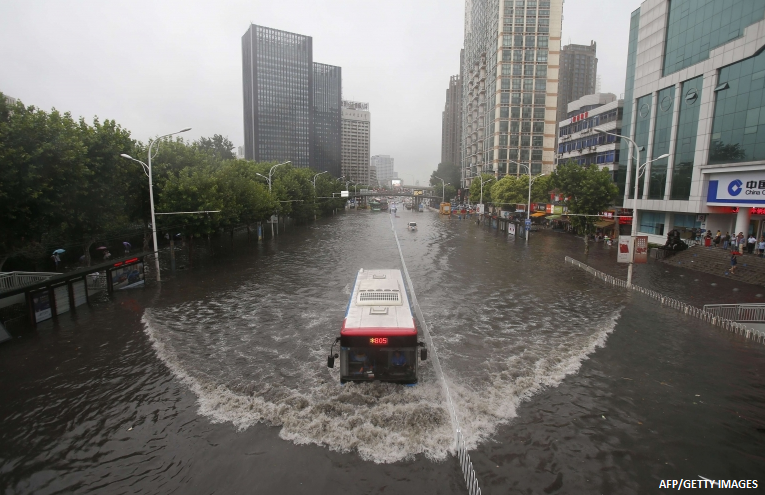 Flooding after heavy storms in Wuhan, central China. Jo | BBC Weather ...