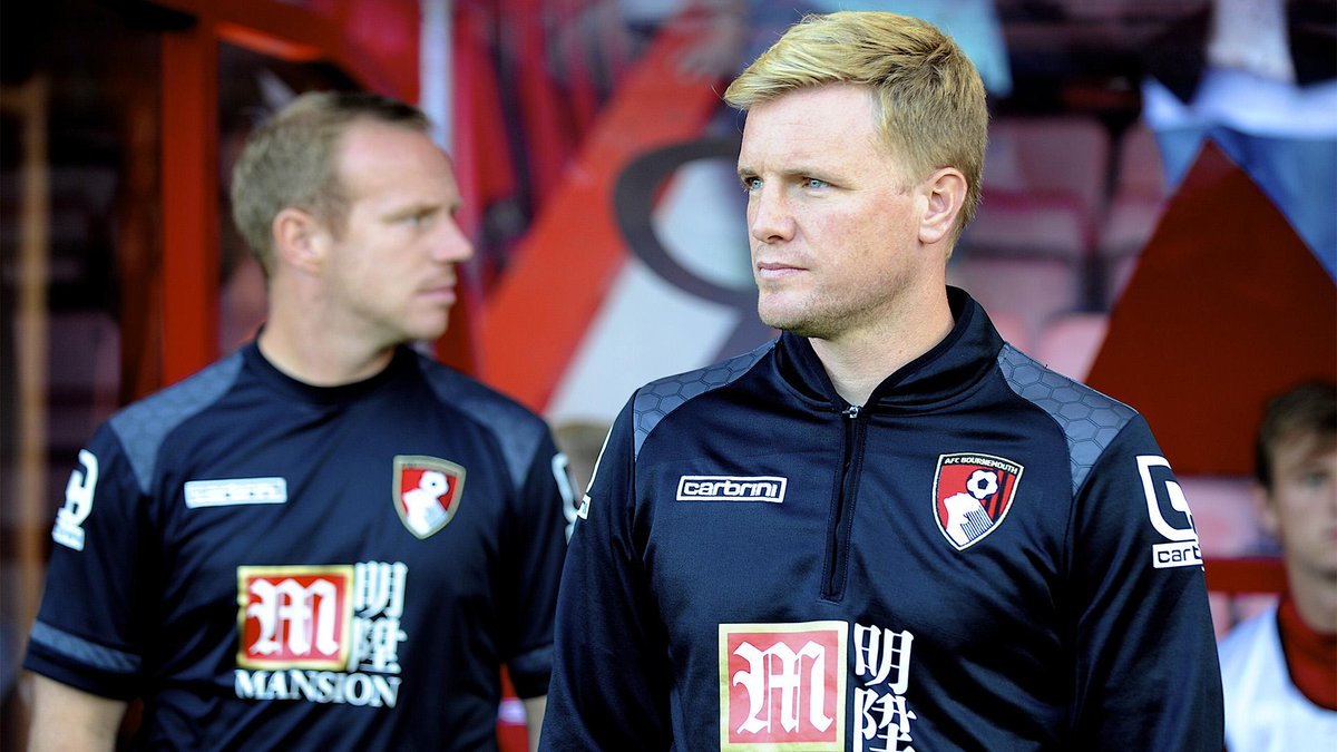 SNAPSHOT: afcb manager Eddie Howe watches the action alongside Simon ...