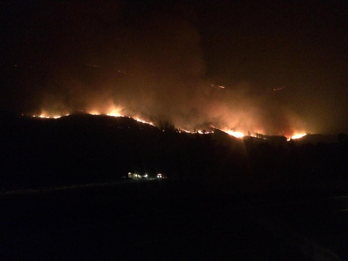 Now just outside Twisp on Hwy 20. Fire has created a ridge and is ...