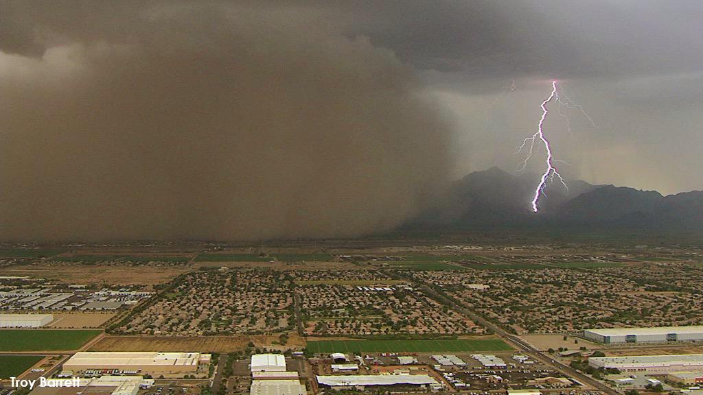 Dust storm and a lightning strike -- almost looks like two different ...