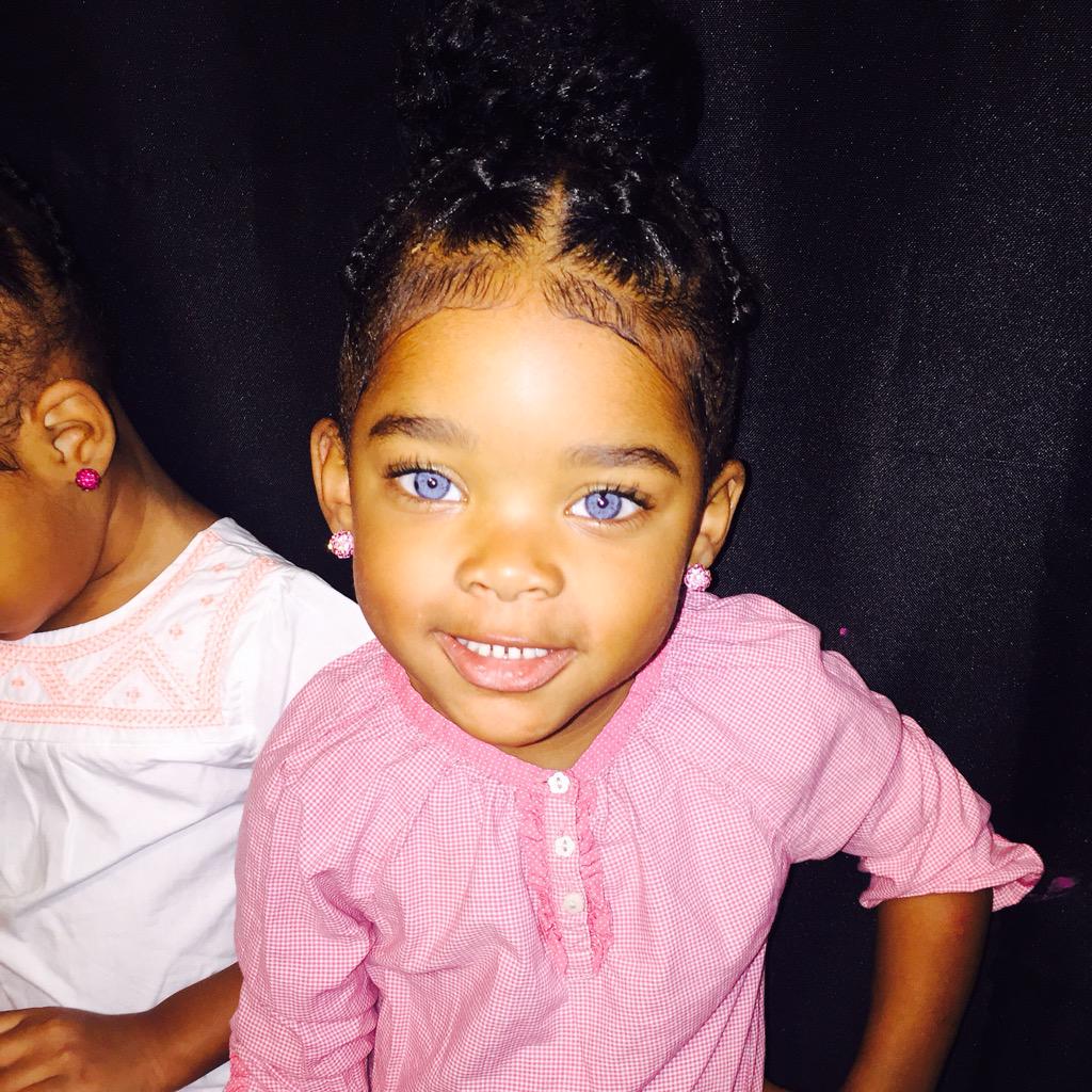 Cute Black Baby Boy With Blue Eyes