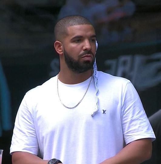 Nas Half Moon Haircut