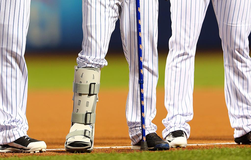 Ruben Tejada has a Mets-themed cane that makes him look downright ...