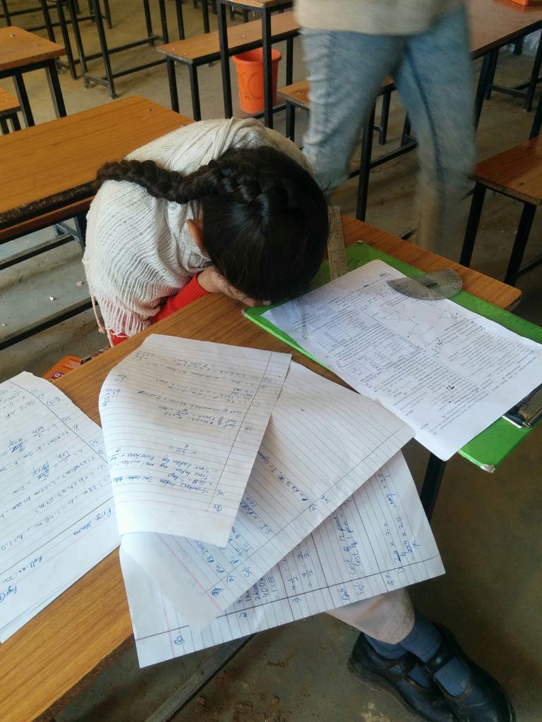 Student Passing Out Papers